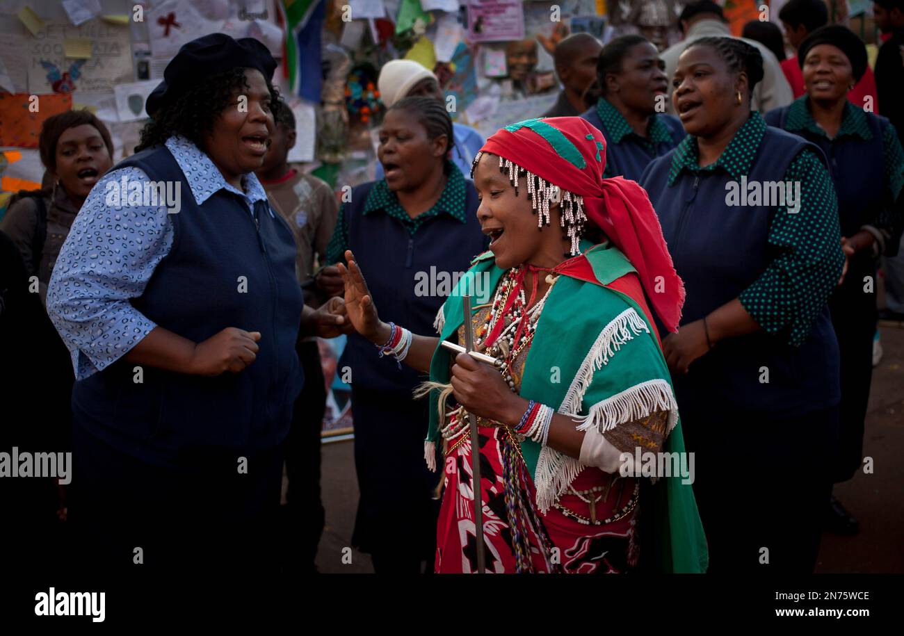 Traditional healer Dimakatso Matjele, center, who says she received ...
