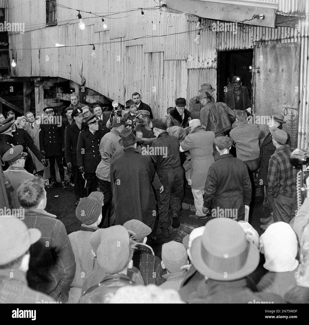 FILE - In this Nov. 1, 1958, file photo, Garnet Clarke, on stretcher ...
