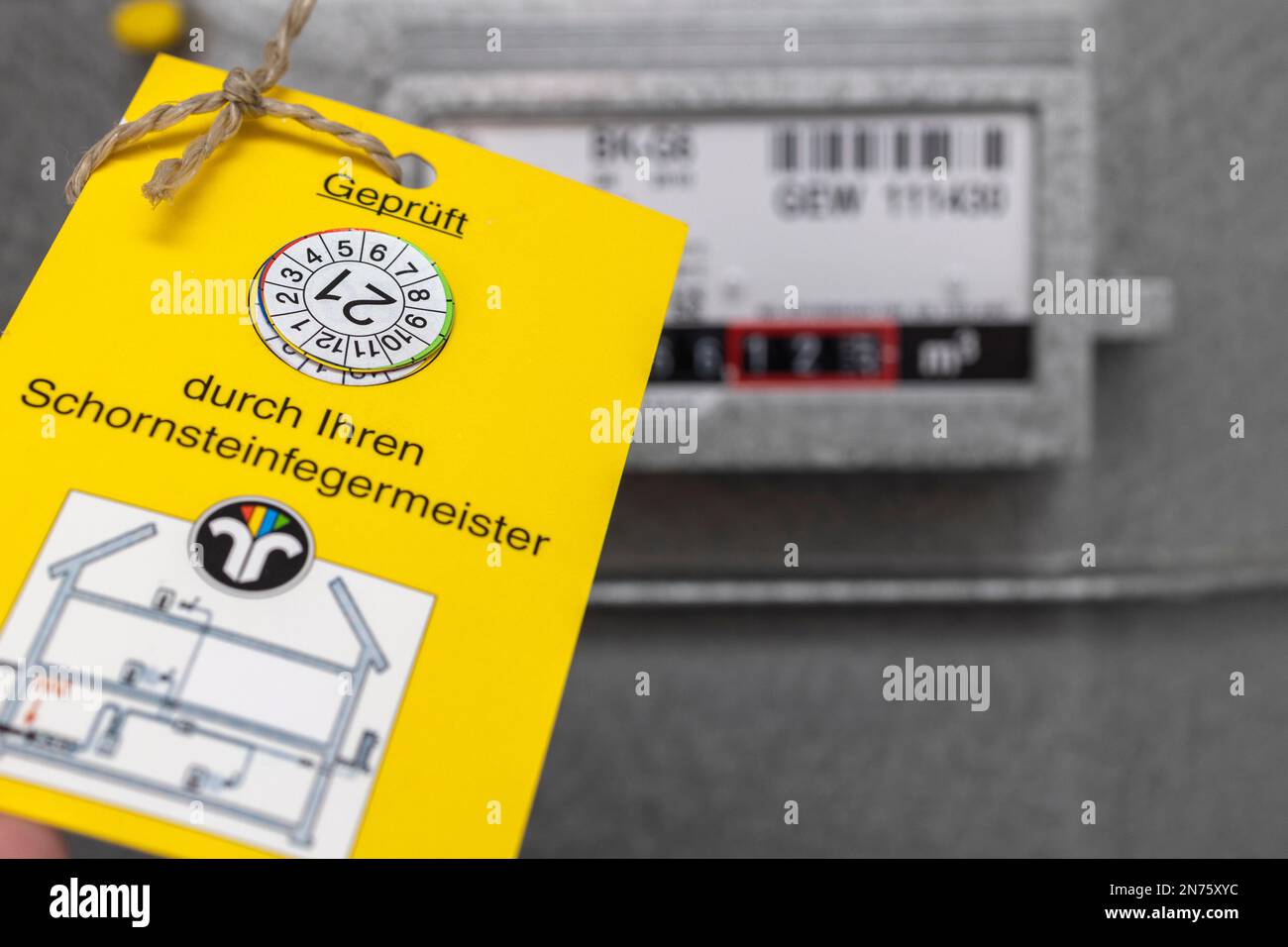 Gas meter in the basement with inspection attachments of the last gas ...