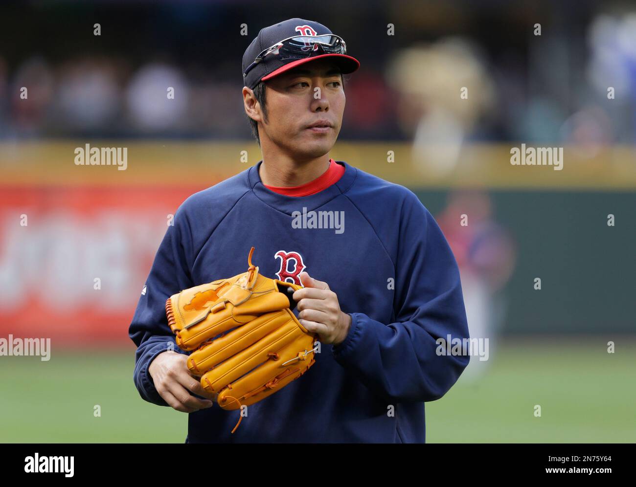 Boston Red Sox pitcher Koji Uehara walks on the field prior to a ...