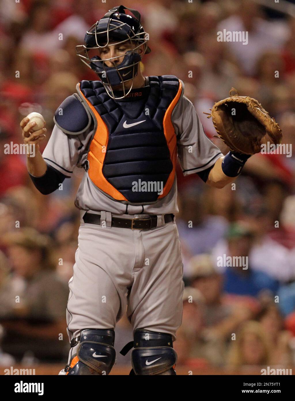 Houston Astros catcher Jason Castro sets to throw the ball back to the ...