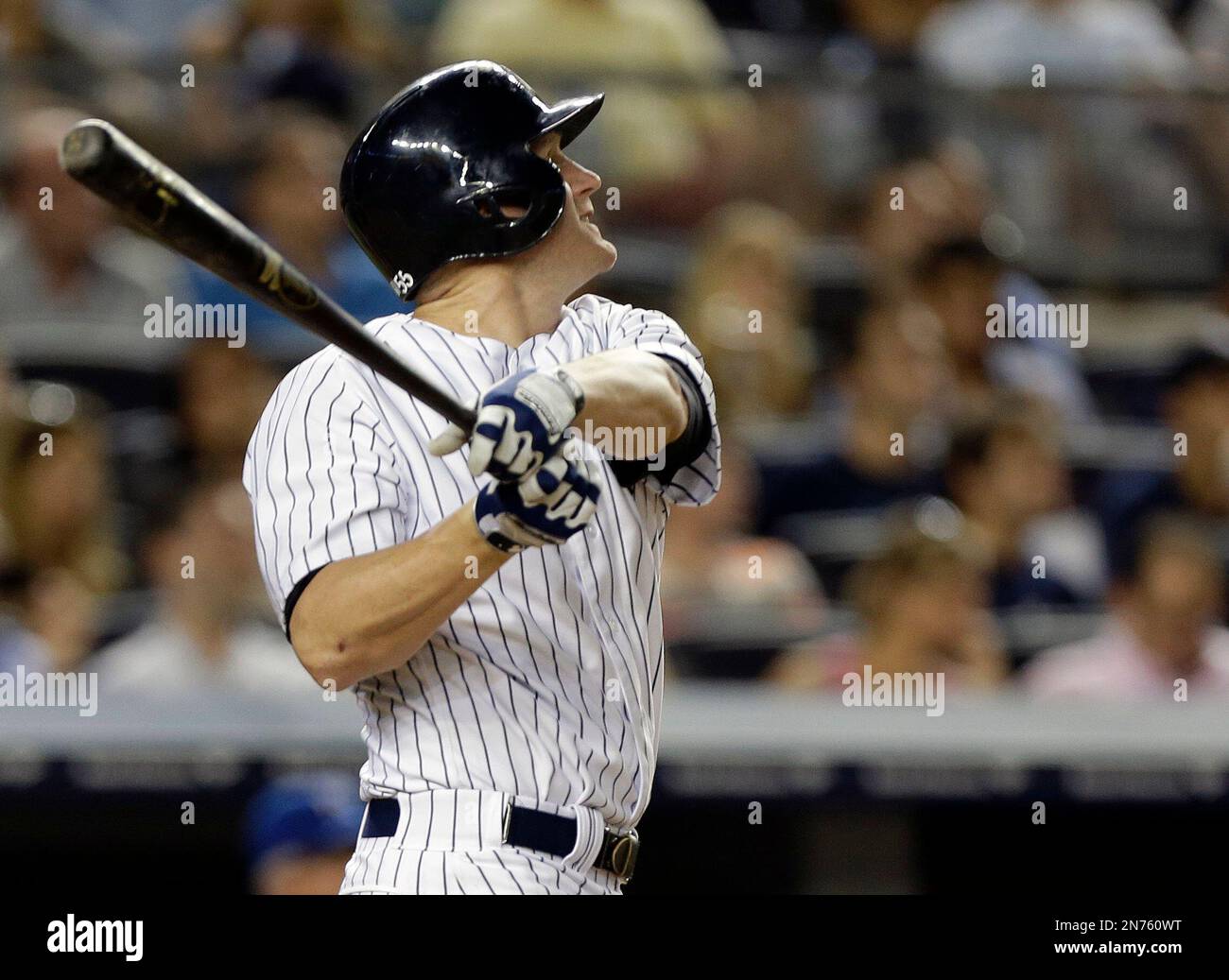 New York Yankees' Lyle Overbay watches his sixth-inning grand slam off ...