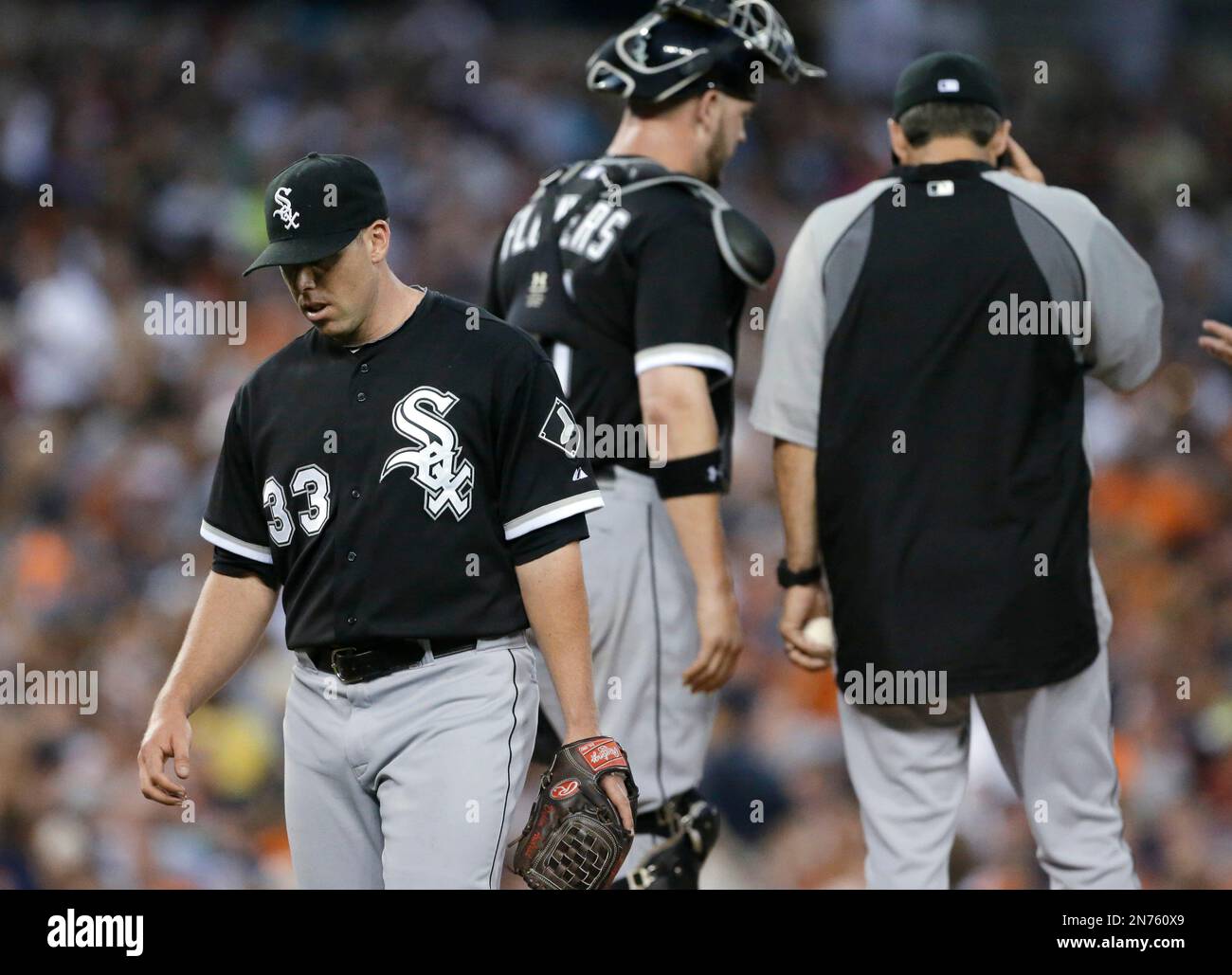 Chicago White Sox starting pitcher Dylan Axelrod leaves during the ...