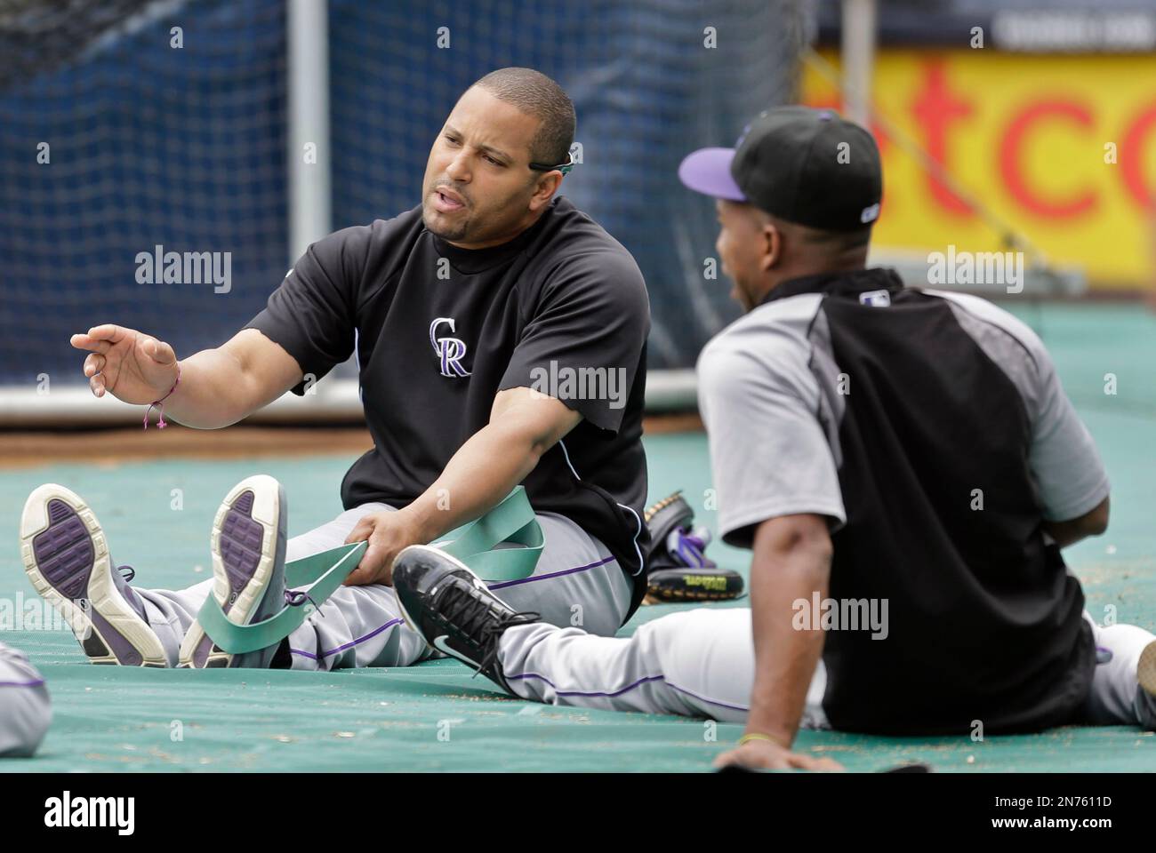 Colorado Rockies catcher Yorvit Torrealba talks to to Jonathan Herrera ...