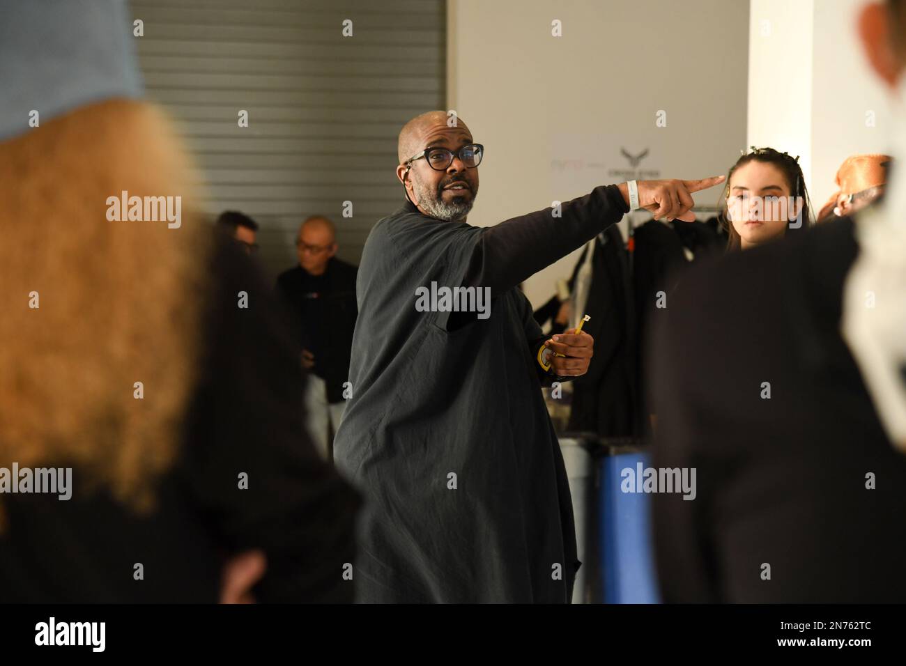 New York, USA. 10th Feb, 2023. Designer Aaron Potts directs models ...