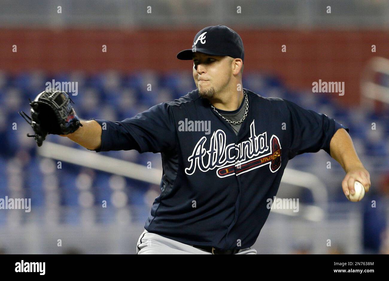 Atlanta Braves' Paul Maholm pitches against the Miami Marlins in the ... Atlanta Braves' Paul Maholm pitches against the Miami Marlins in the ...