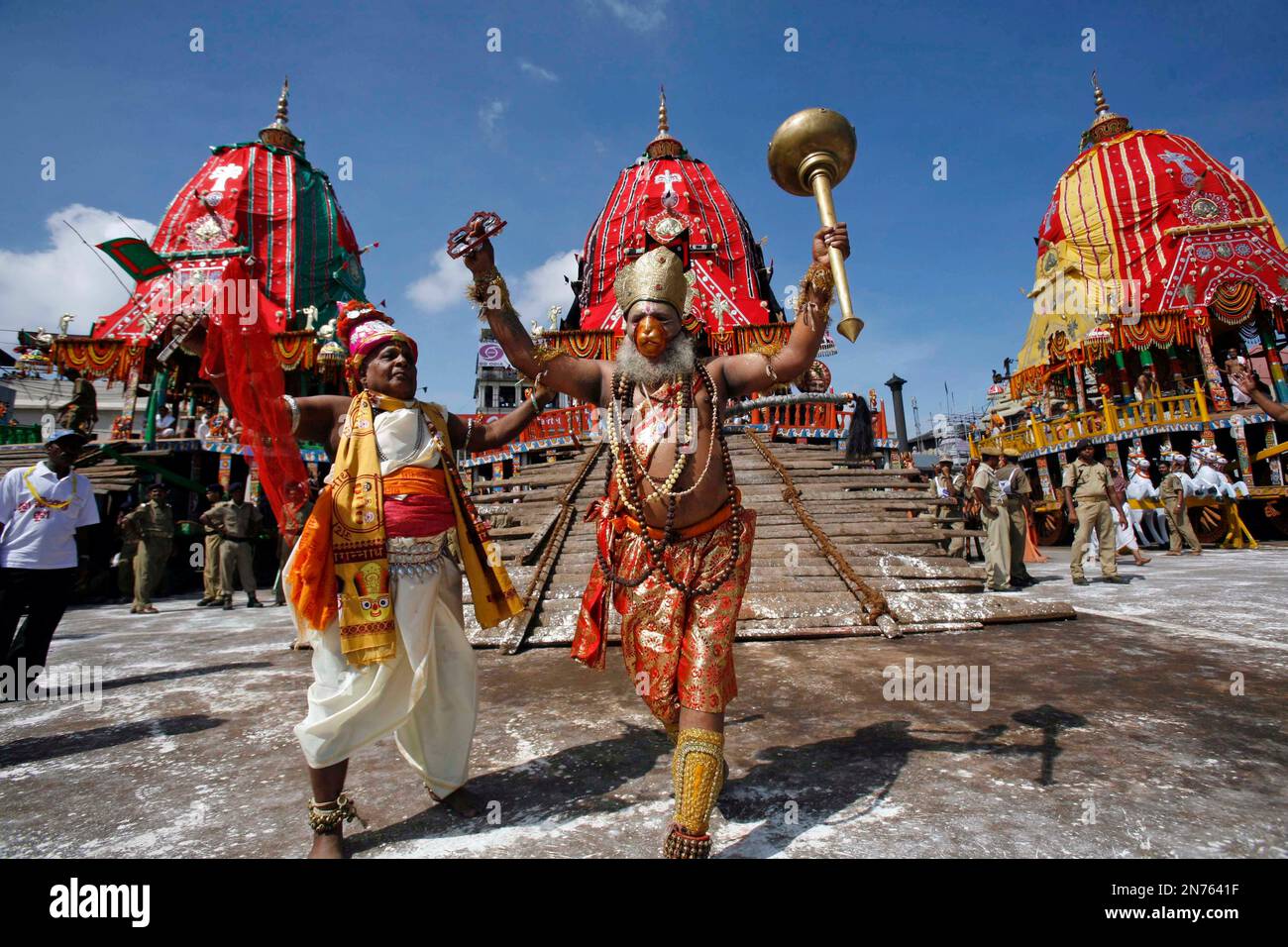 Traditional dancers of the Shree Jagannath temple dance during the ...