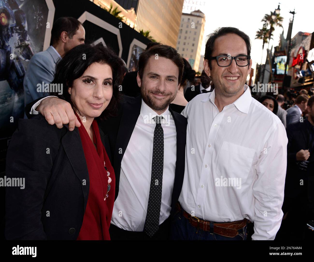 Actor Charlie Day, center, Warner Bros. Exec Sue Kroll, left, and ...