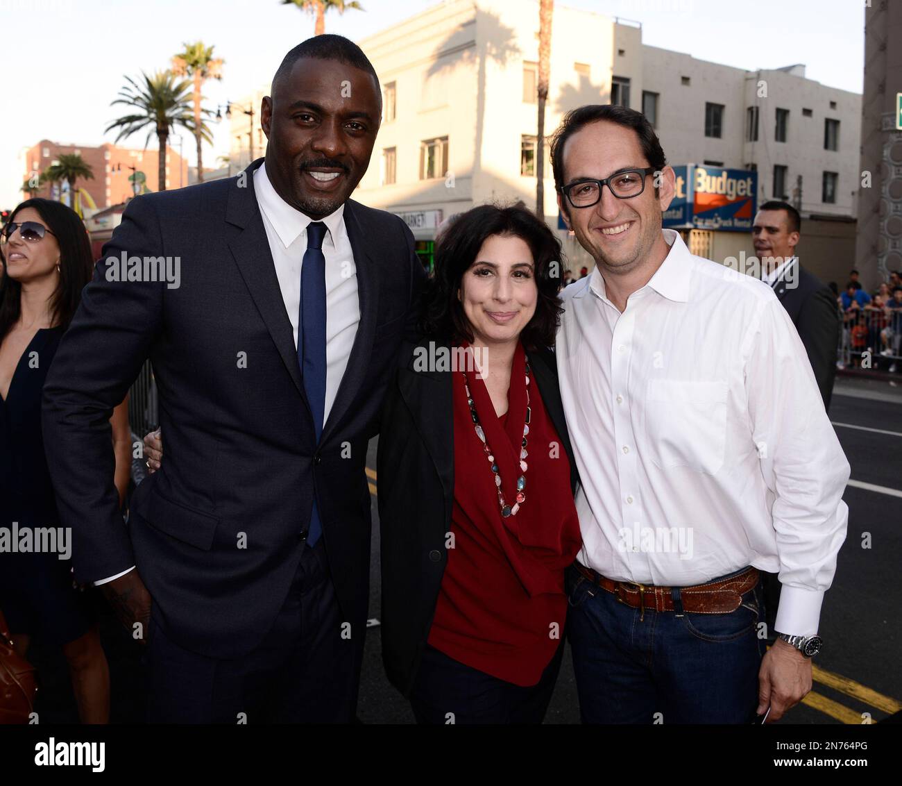 Actor Idris Elba, left, Warner Bros. Exec Sue Kroll, center, and Warner ...