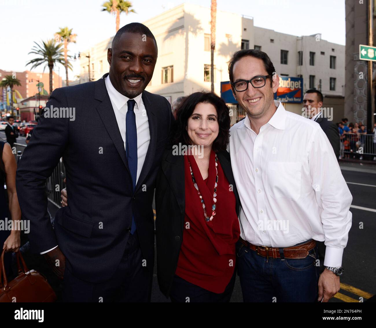 Actor Idris Elba, left, Warner Bros. Exec Sue Kroll, center, and Warner ...