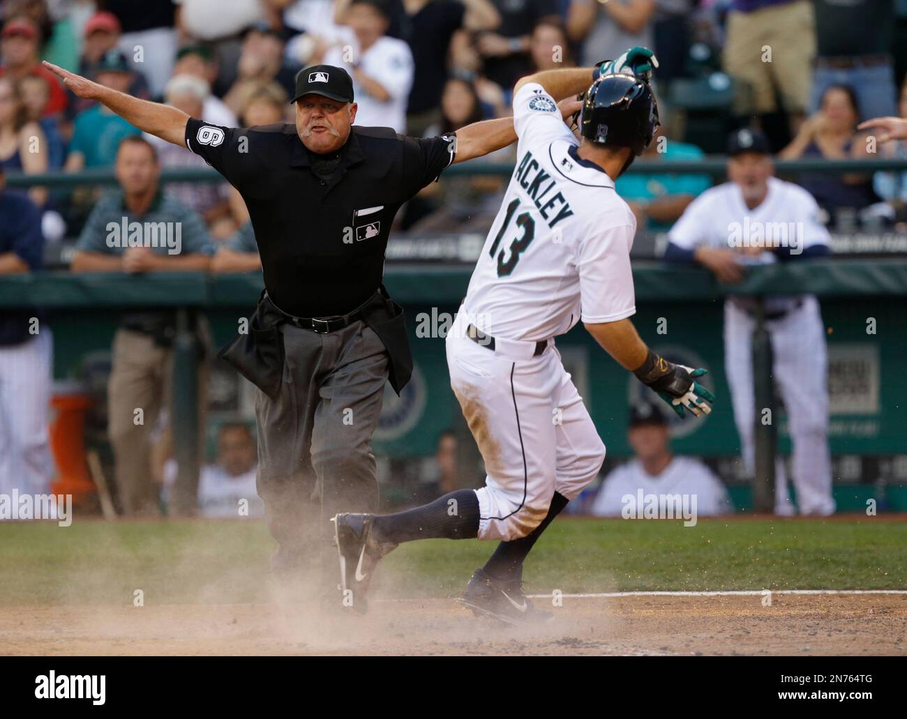 Home plate umpire Jim Joyce calls Seattle Mariners' Dustin Ackley safe ...