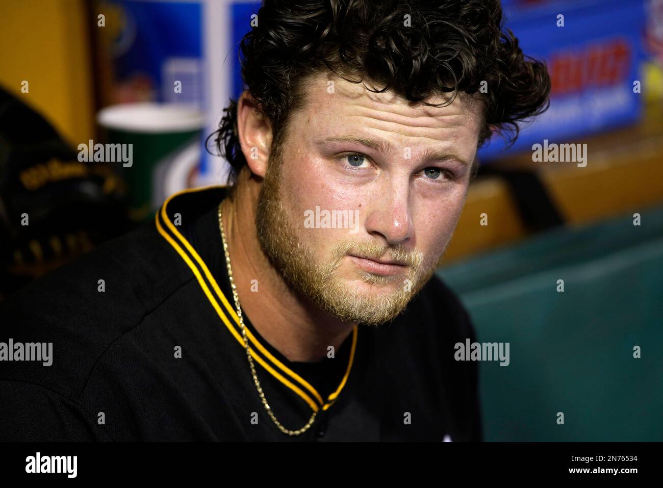 Pittsburgh Pirates starting pitcher Gerrit Cole sits on the bench ...