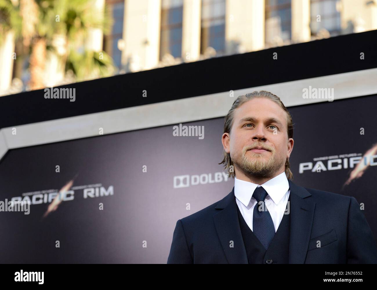 Actor Charlie Hunnam arrives on the red carpet at the LA premiere of ...