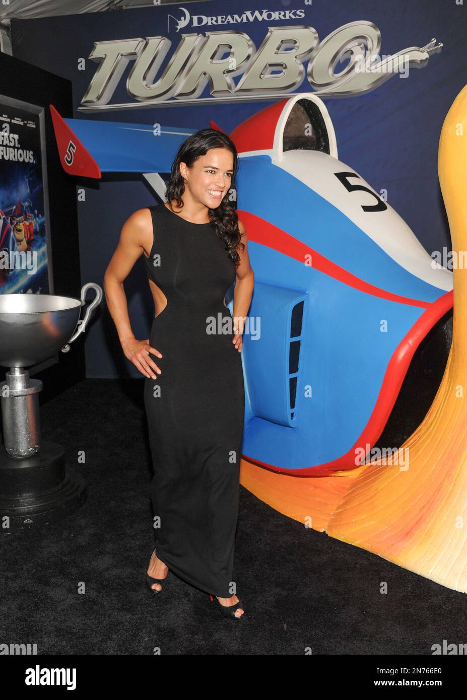 Actress Michelle Rodriguez attends the premiere of DreamWorks' "Turbo ...