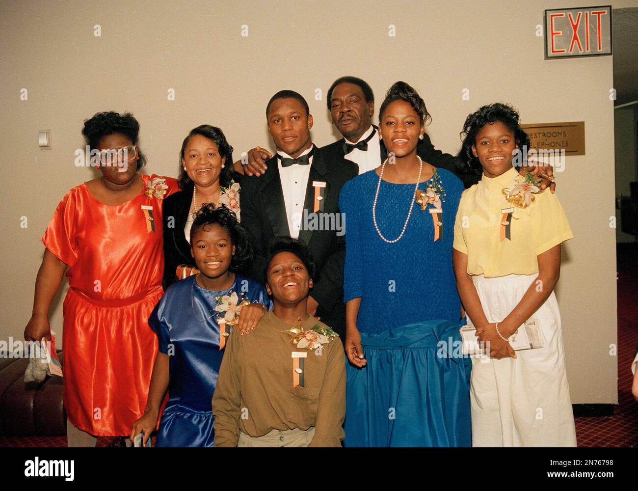 Heisman trophy winner for 1988 Barry Sanders, center, poses with his ...