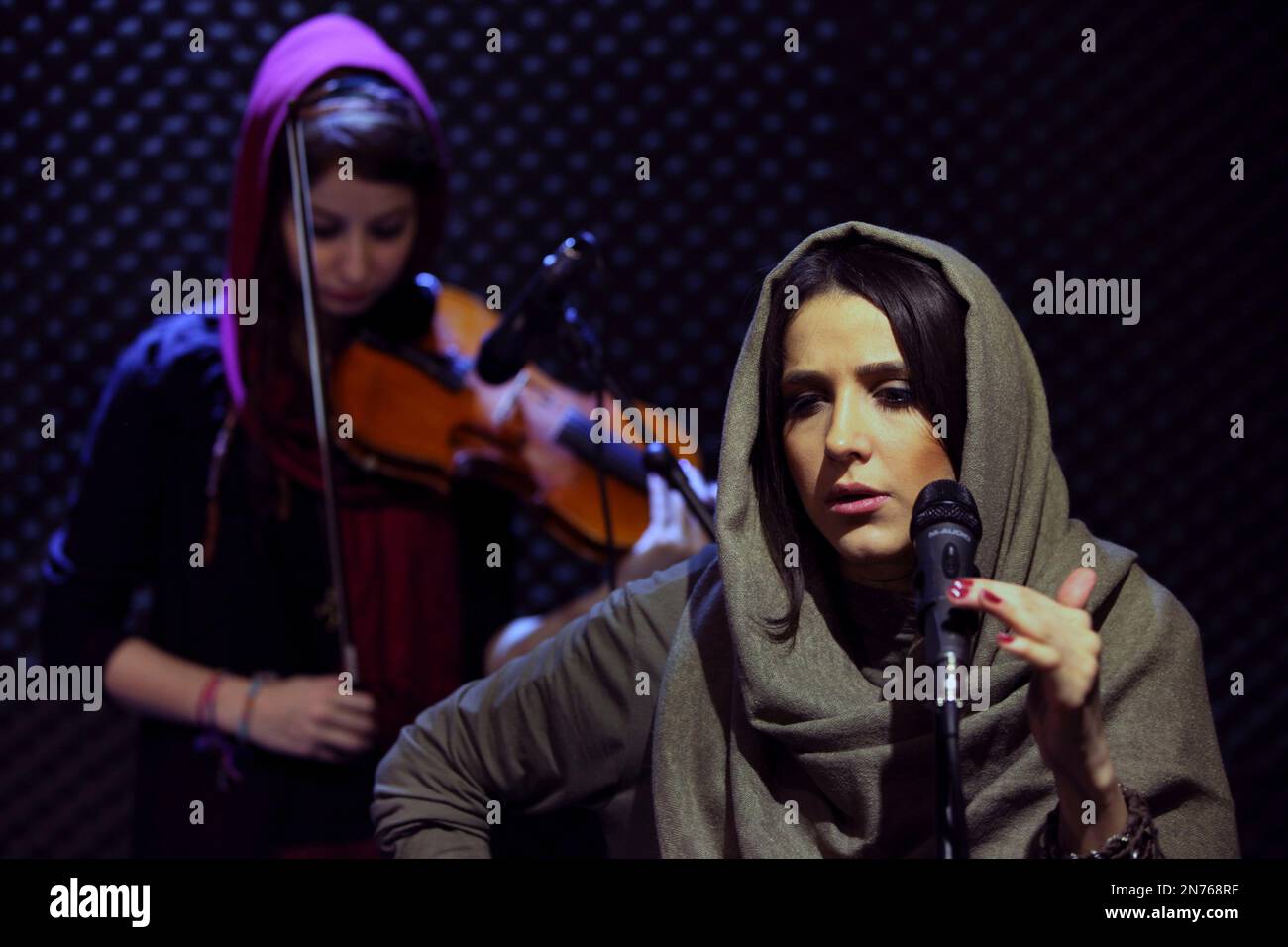 In this picture taken on Friday, Jan. 25, 2013, female Iranian back ...