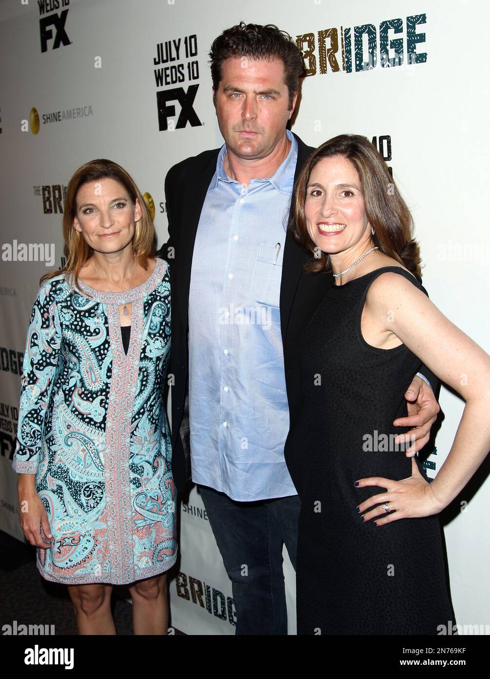 Elwood Reid, center, Carolyn Bernstein, right, and Meredith Stiehm pose ...