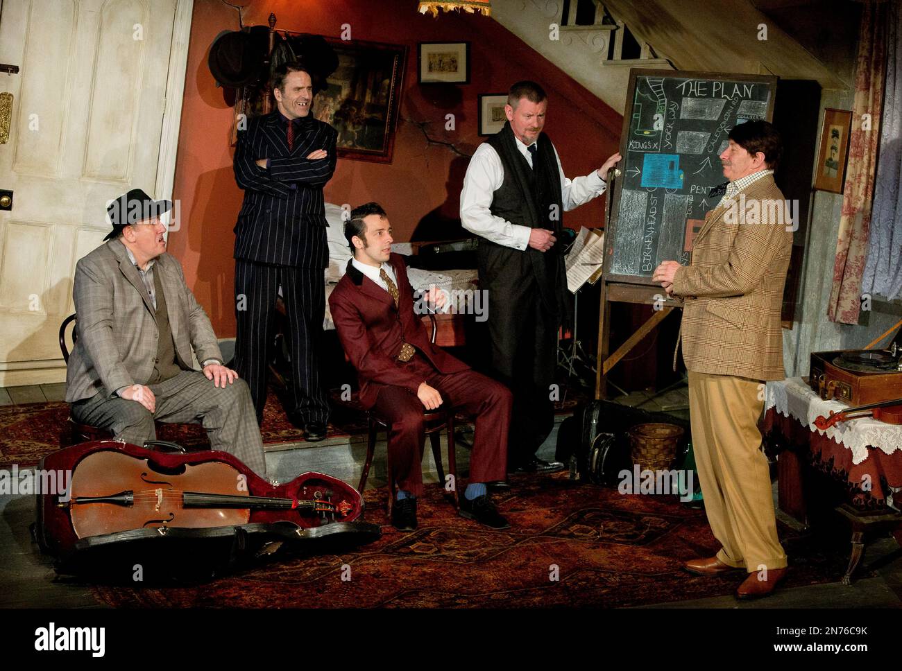 Actors, from left to right, Chris McCalphy, who plays One Round, Con O ...