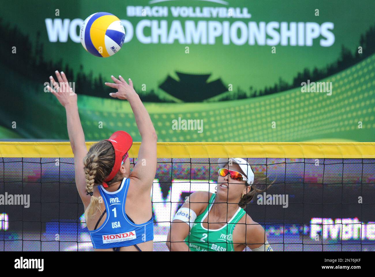 Brazil's Barbara Seixas De Freitas spikes the ball against USA's April ...