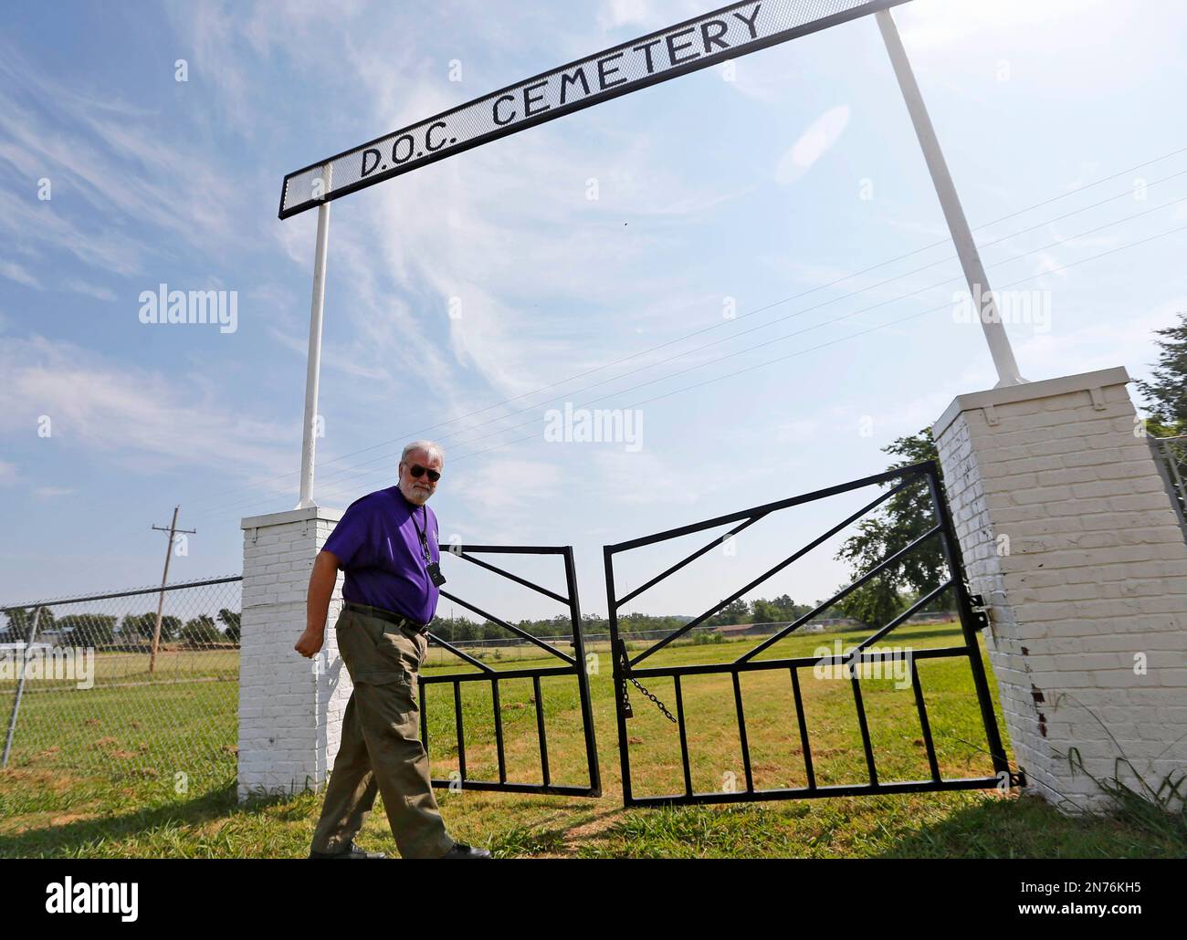 Tom Logan, chaplain at the Jackie Brannon Correctional Center, unlocks ...