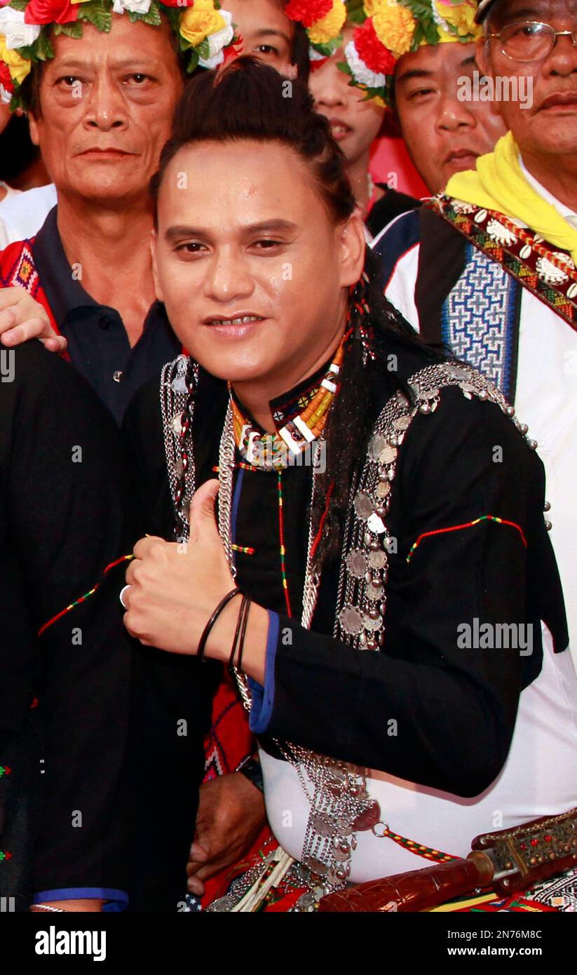 Taiwanese singer Sangpuy Katatepan poses for photographers upon arrival ...