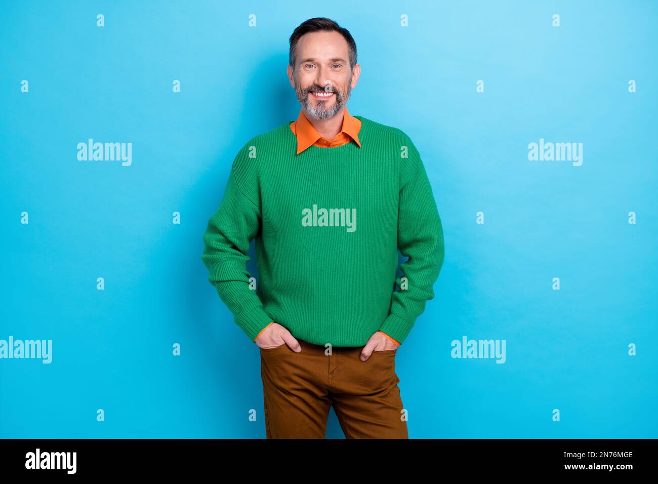 Photo of successful satisfied person put hands pockets toothy smile ...