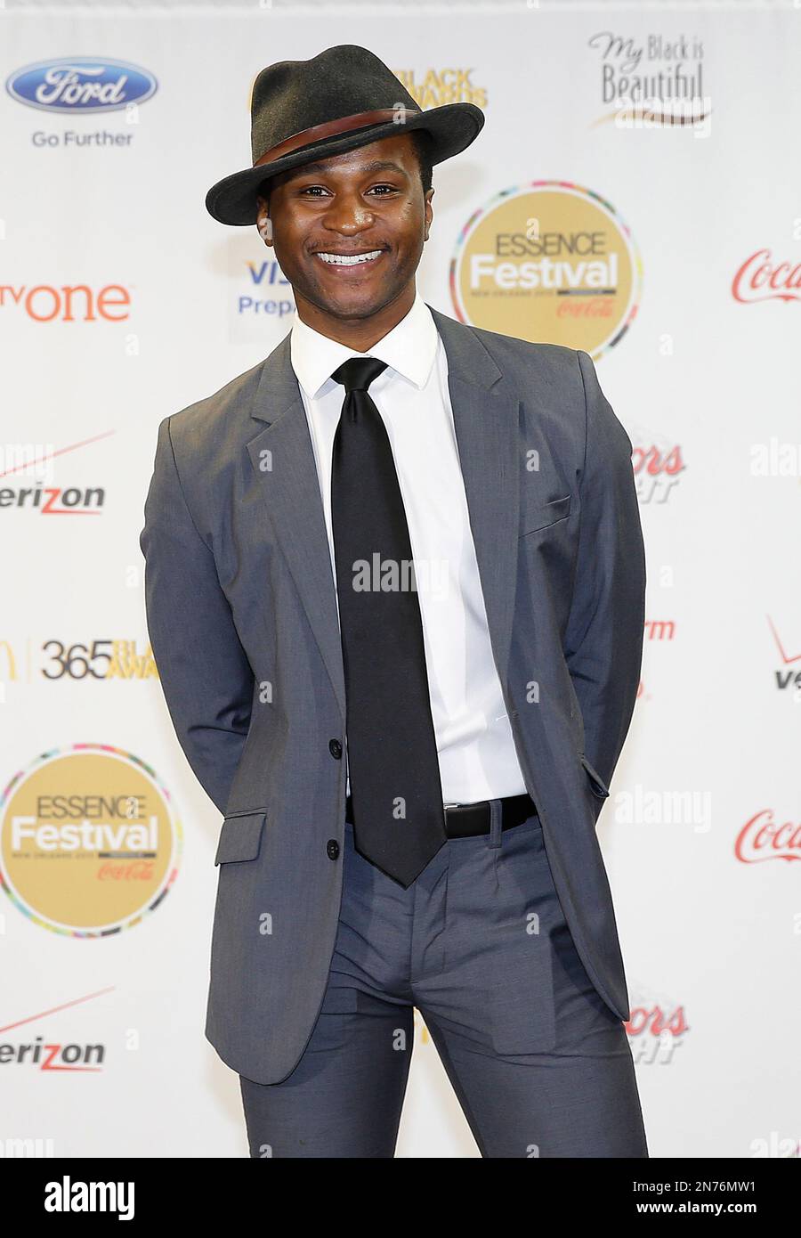Roman GianArthur poses for a photo in the pressroom at the Essence ...