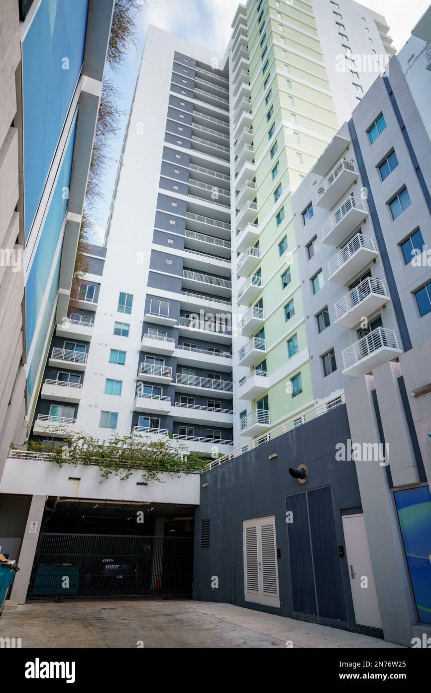 Highrise towers in the city. Back alley loading docks Stock Photo - Alamy
