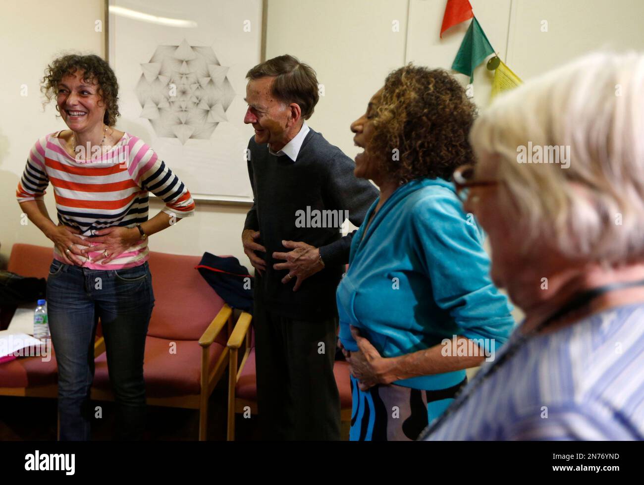 Joanna Foster, actress, singer and singing teacher, left, leads a ...
