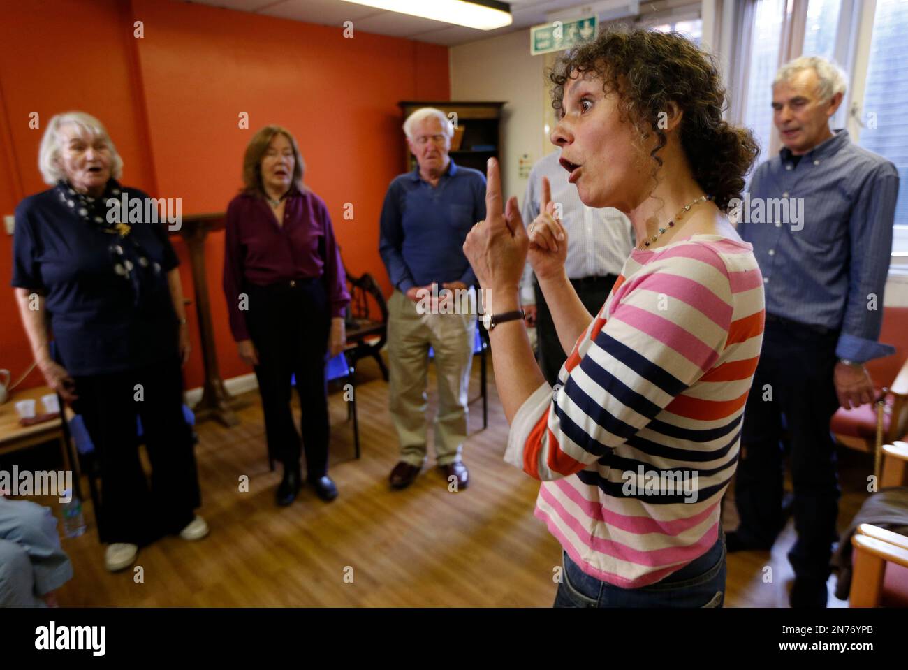 Joanna Foster, actress, singer and singing teacher, second right, leads ...