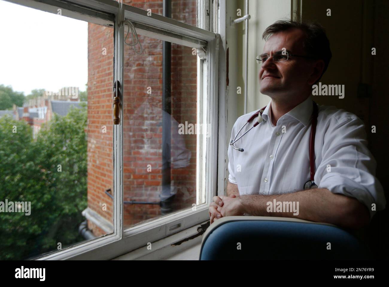 Dr Nicholas Hopkinson, consultant chest physician, speaks to the ...