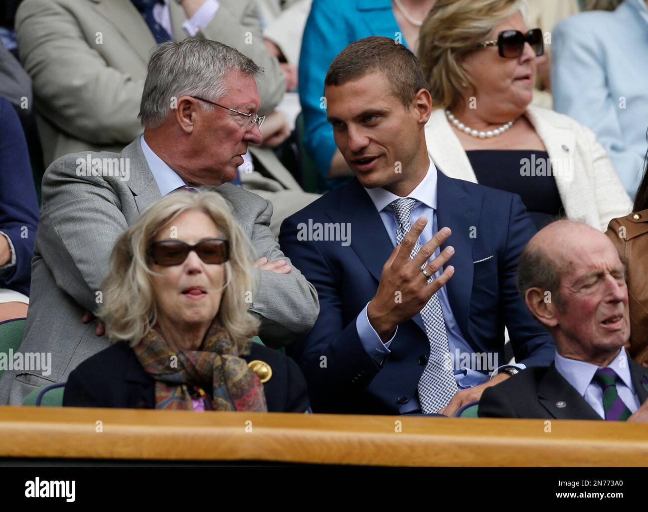 Former Manchester United manager Alex Ferguson, back left, and ...