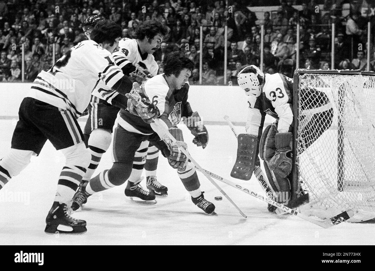 Chicago Black Hawks' Keith Magnuson (3) tries unsuccessfully to block ...