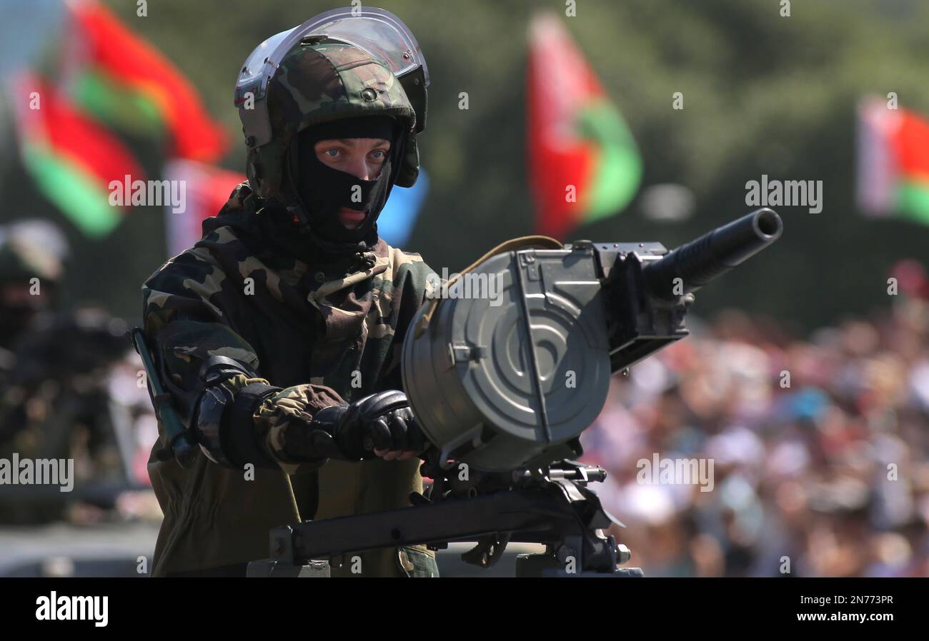 Belarusian army special trooper sits atop of an APC during a parade ...