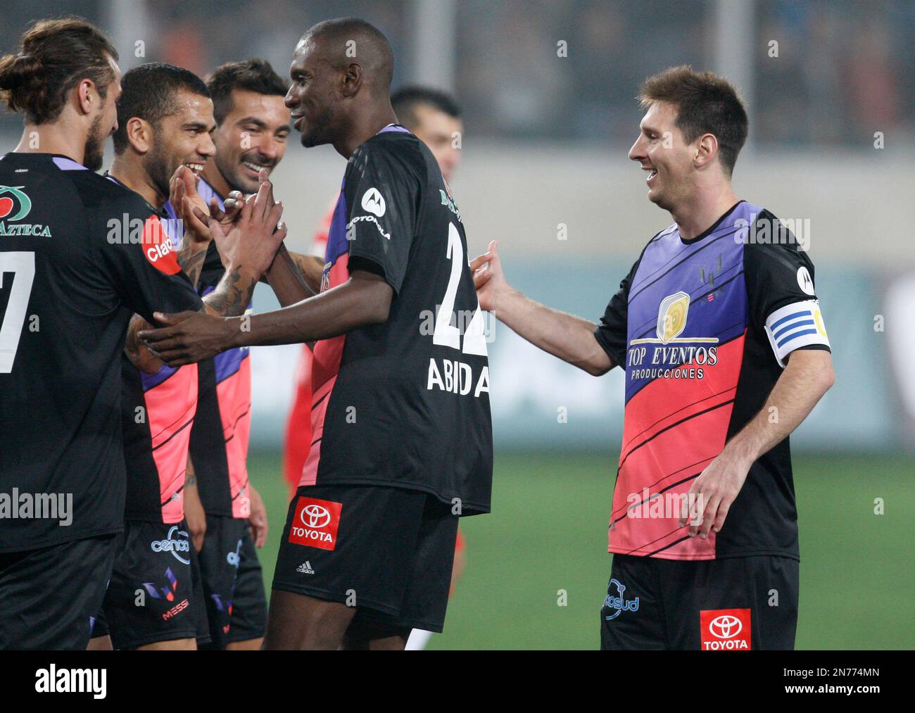 Argentina's Lionel Messi celebrates with teammates Daniel Alves, second ...