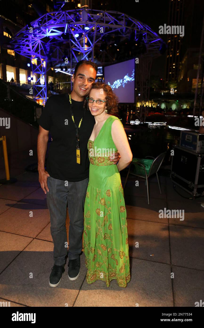 From left, Performer John Tejada and Green Galactic's Lynn Tejada pose ...