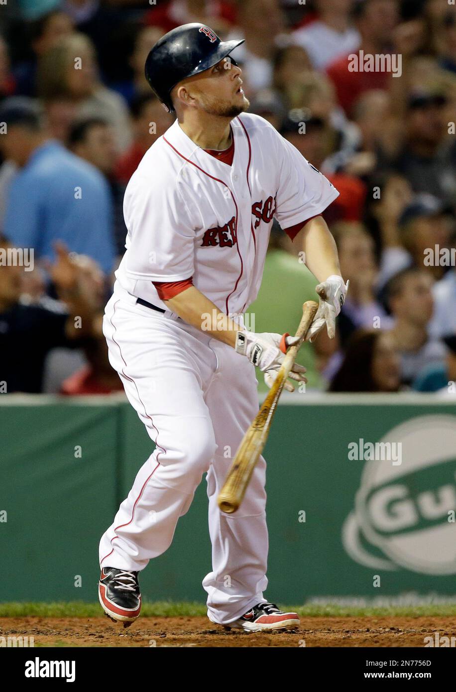 Boston Red Sox's Brandon Snyder watches the flight of his three-run ...
