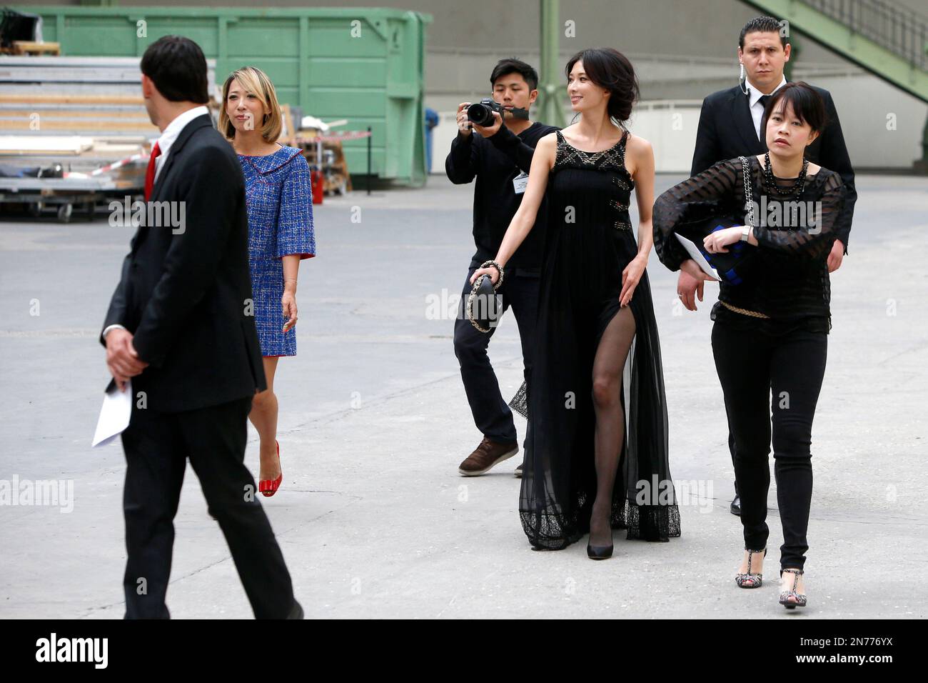Actress Lin Chi-ling, third right, arrives at the Grand Palais to ...