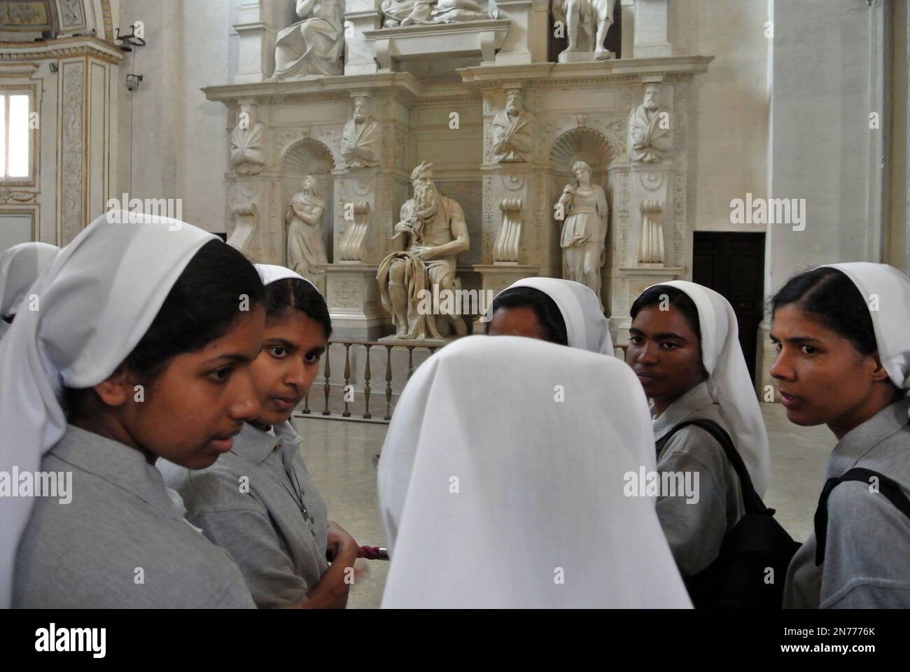Nuns admire Michelangelo's Moses masterpiece inside St. Peter's in ...