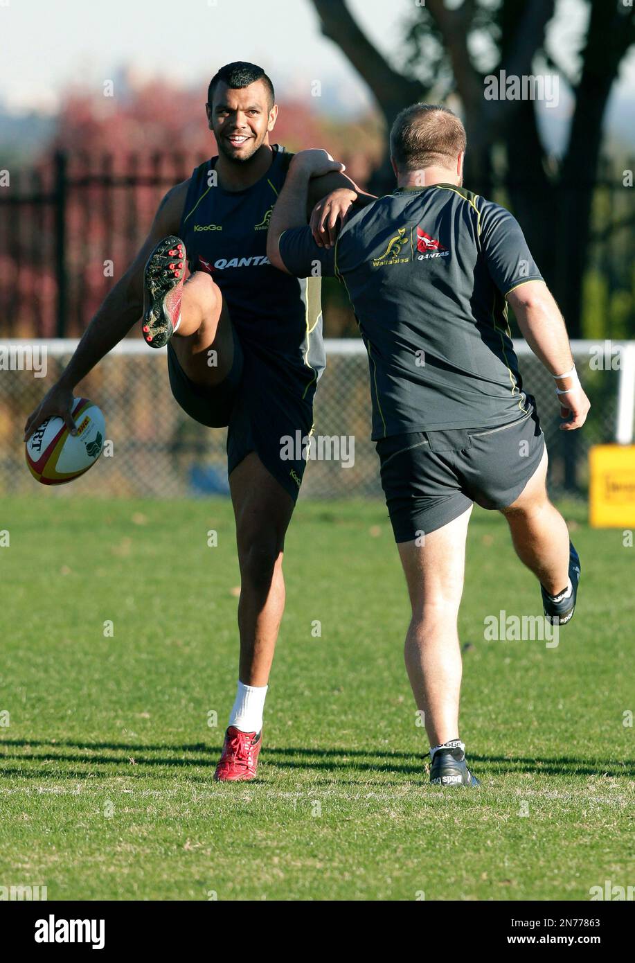 Australia's rugby player Kurtley Beale, left, stretches with teammate ...