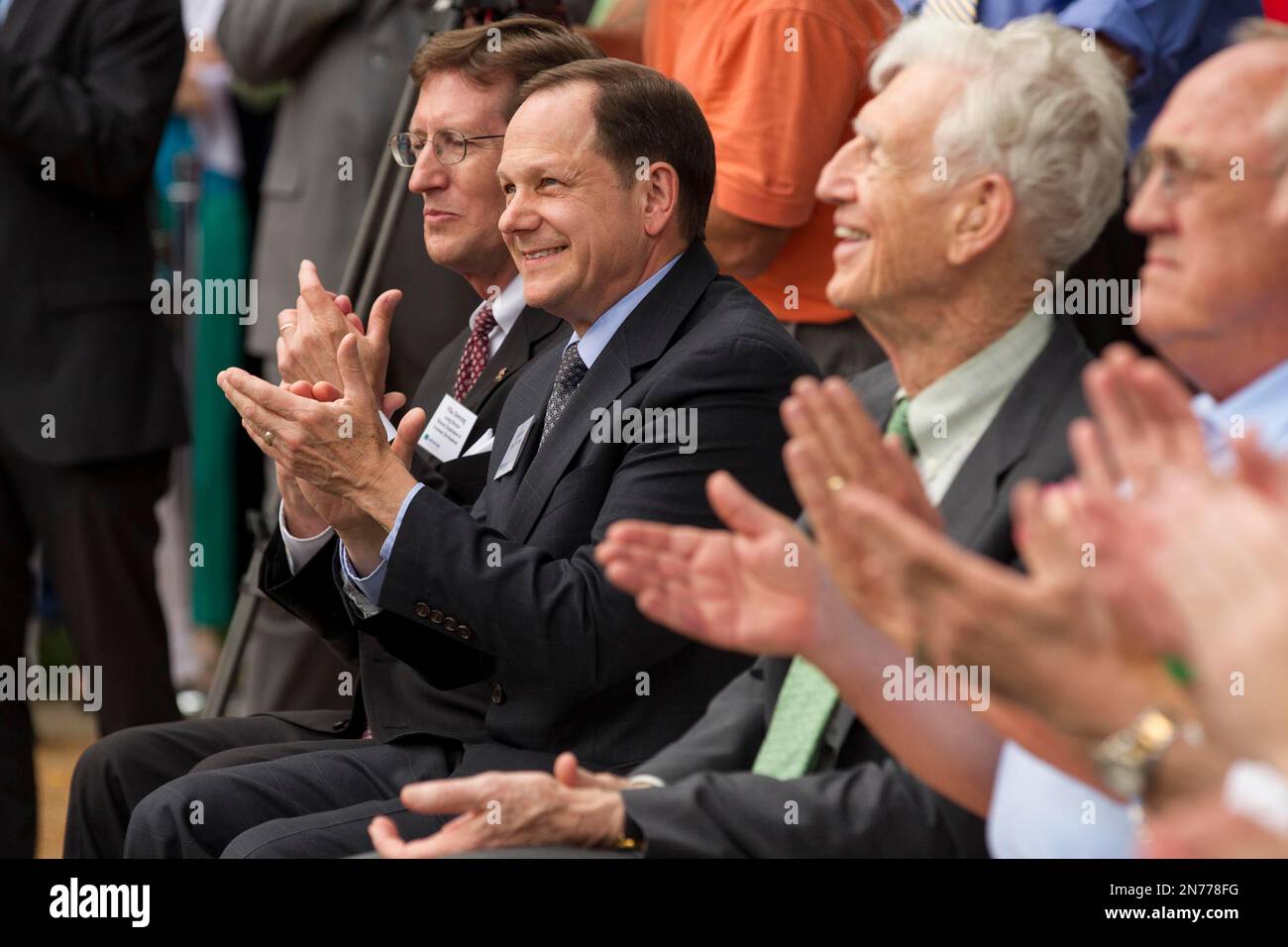 Mike Downing, from left to right, acting director for economic ...