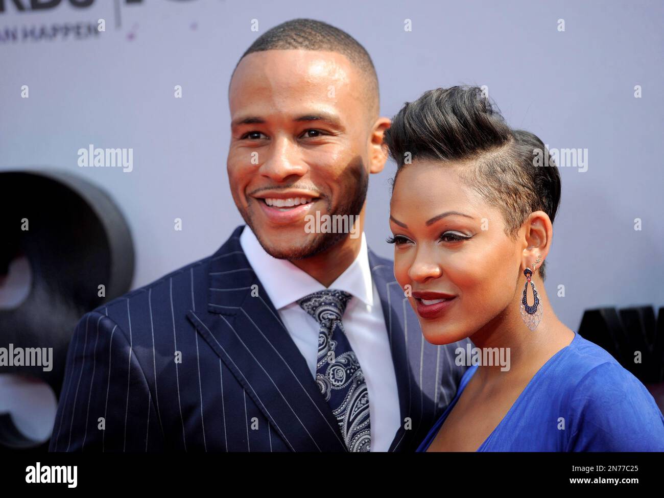 DeVon Franklin, left, and Meagan Good arrive at the BET Awards at the ...