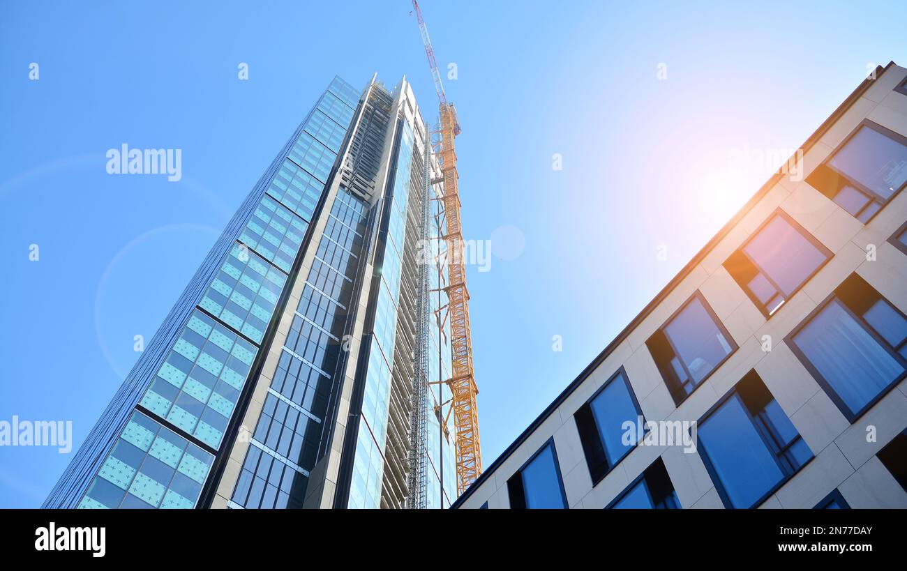 High-rise building under construction. Modern office building Stock ...