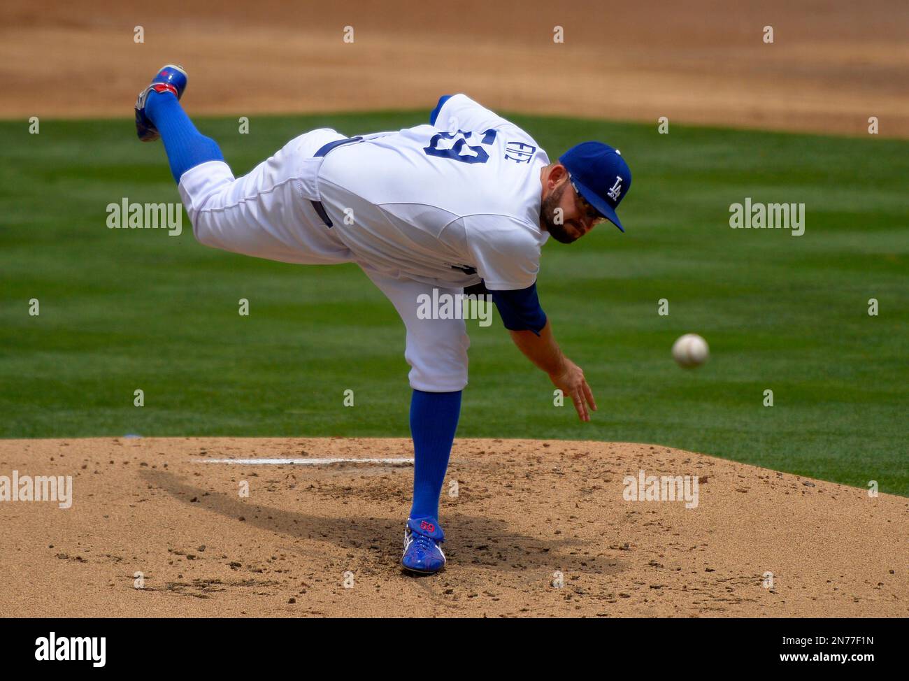Los Angeles Dodgers starting pitcher Stephen Fife throws to the plate ...