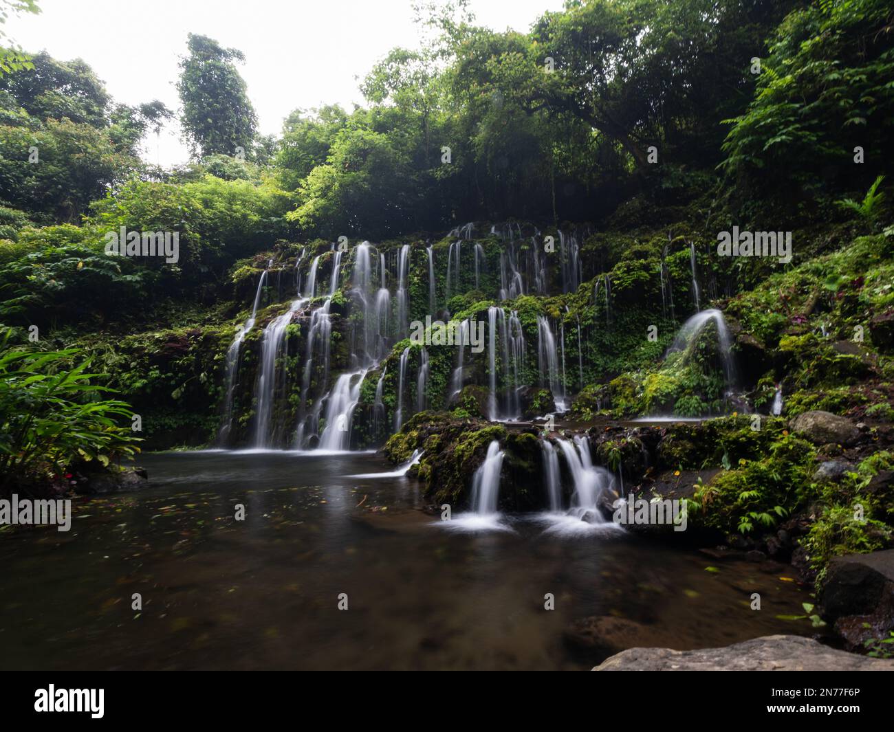 A scenic view of the Banyu Wana Amertha Waterfall in Bali, Indonesia ...