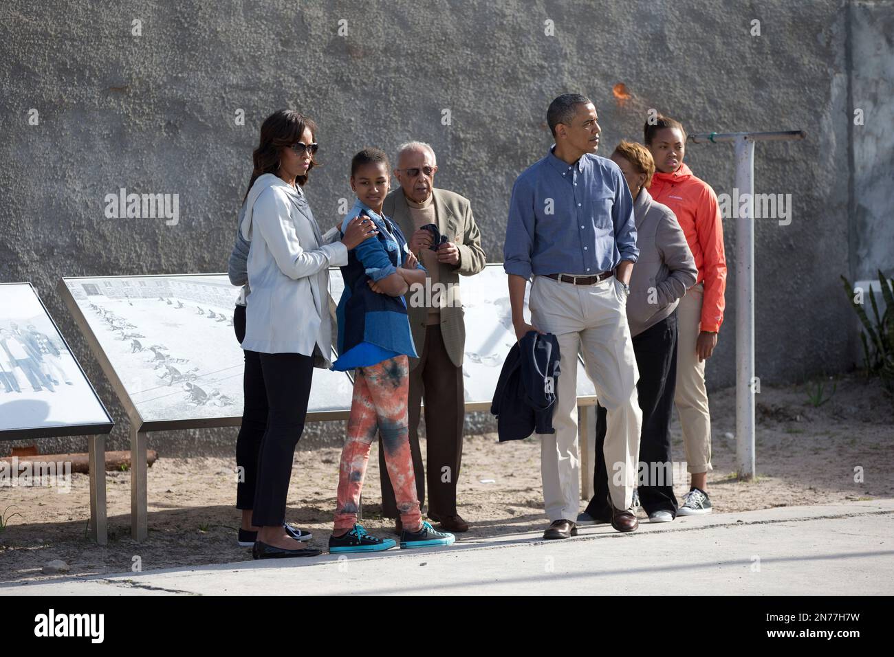 From left, first lady Michelle Obama, Sasha Obama, Ahmed Kathrada ...