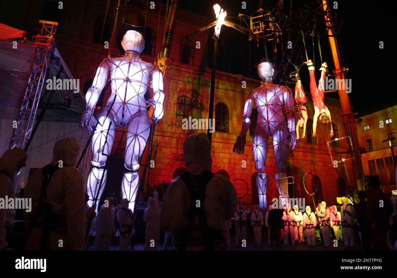 Actors perform during an open air event in front of the Munich opera ...