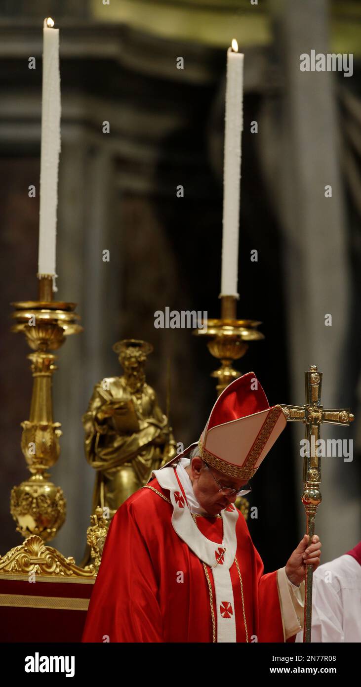 Pope Francis holds the pastoral staff after he bestowed the pallium to ...