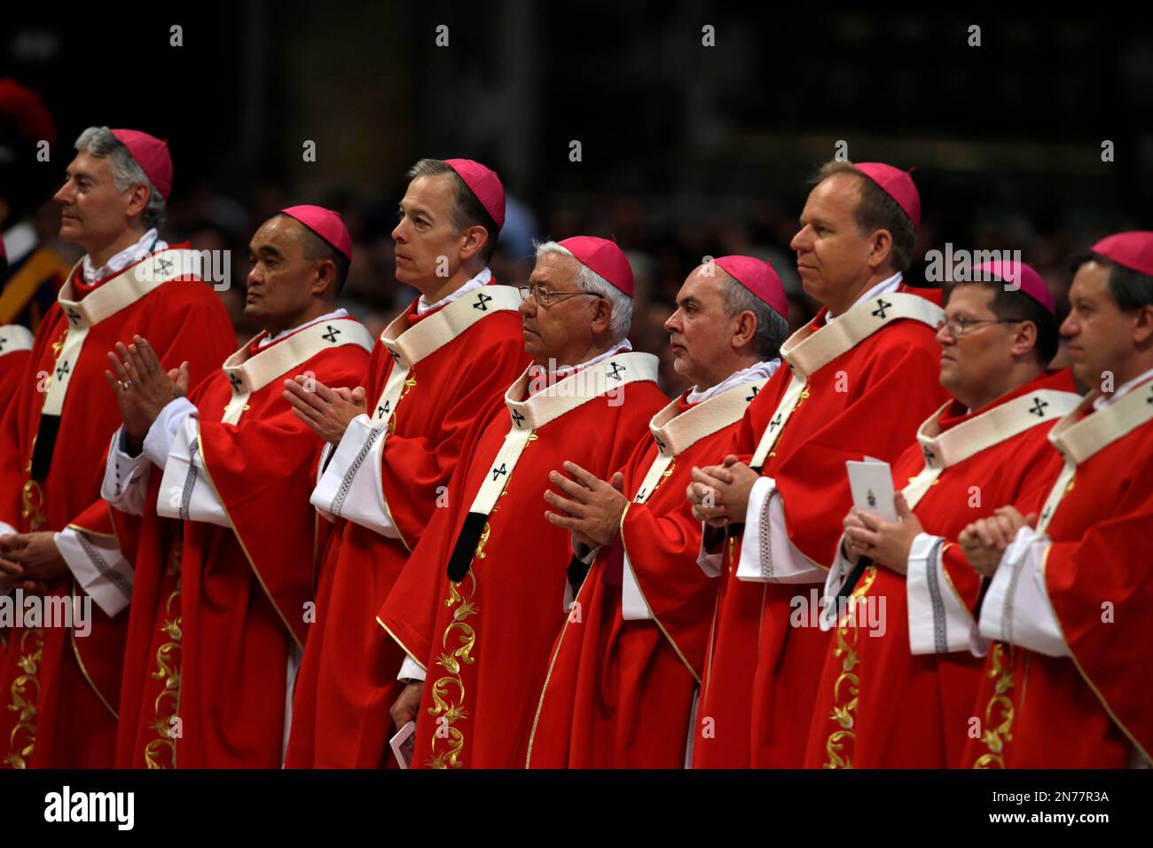 Prelates gather in front of the altar after receiving from Pope Francis ...