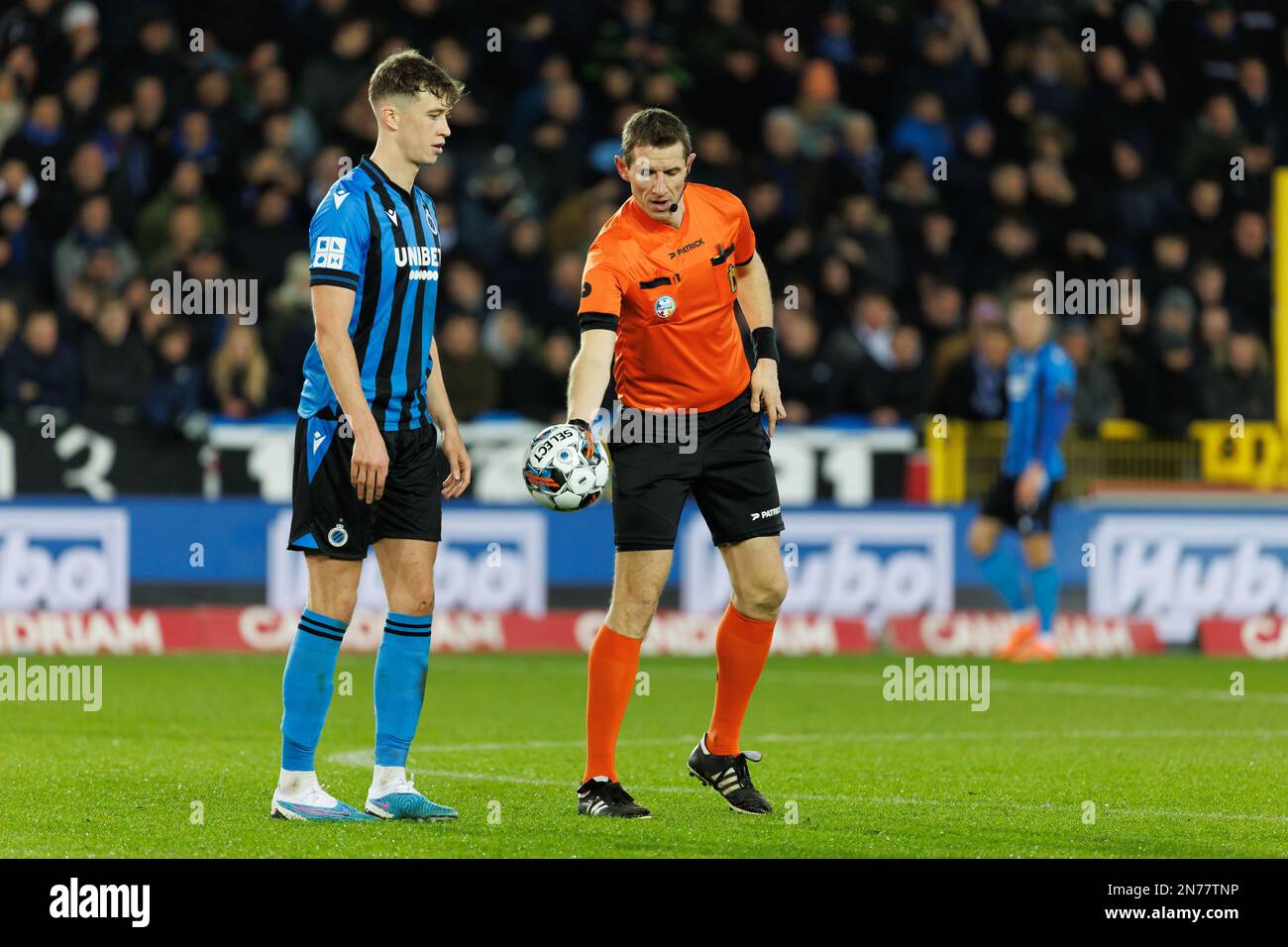 Club's Jack Hendry and referee Jan Boterberg pictured during a soccer ...